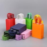China Reusable  flat bottom paper bags christmas paper gift bags paper twist handle bags for sale