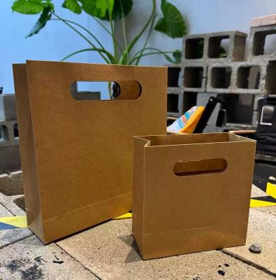 China High-grade Kraft Paper Bag Thickened Hole Special Handbag Gift Bag Square Gift Packaging Bag Storage Custom Logo for sale