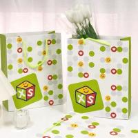 China Clothing Store Flower Paper Shopping Bags Holiday Gift Packaging Bags Tote Bags Custom Printed Logo for sale