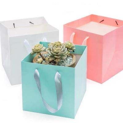 China Custom Floral Arrangement Gift Bags For Flower Shops And Gift Stores with logo Buddy Bags for sale