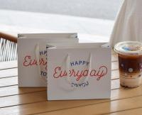 China Customized White Card Reusable Paper Bag Banquet Birthday Gift Paper Color Printing Clothing Tote Bag for sale