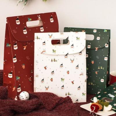China Festive Paper Gift Bags With Handles For Christmas Candy And Small Gifts Custom Logo for sale