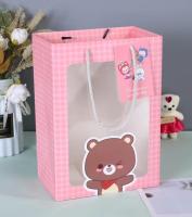 China Custom Paper Gift Bags With Die-Cut Window For Romantic And Festive Packaging for sale