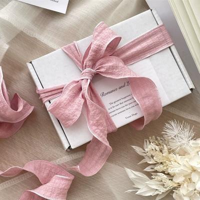 China Luxury Textured Ribbon Gift Boxes Custom Rigid Packaging For Jewelry Cosmetics Boutique Gifts for sale