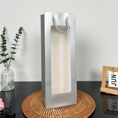 China Long Striped White Cardboard Gift Bags Windowed Handled for Bouquet Gift Packaging for sale