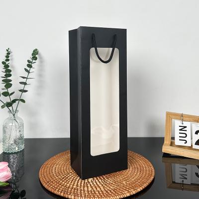 China Elegant Window Gift Bags With Rope Handles Premium Party Favor Packaging for sale