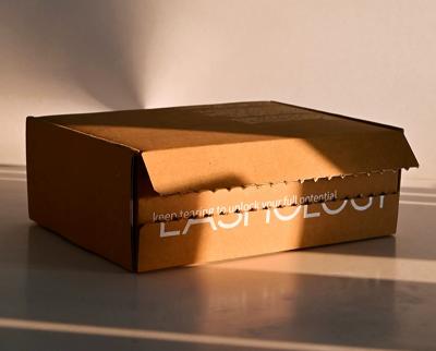China Custom Tear Strip Corrugated Mailer Boxes Colorful Kraft Packaging for Clothing Cosmetics Shipping for sale