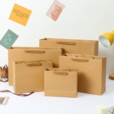 China Kraft Paper Packing Bag Christmas Gift Bag Party Gift Hand-Held Packaging Bag Takeaway Packing Bag for sale