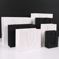 China Premium Kraft Paper Gift Bags Thickened Clothing Shopping Bags With Rope Handles for sale