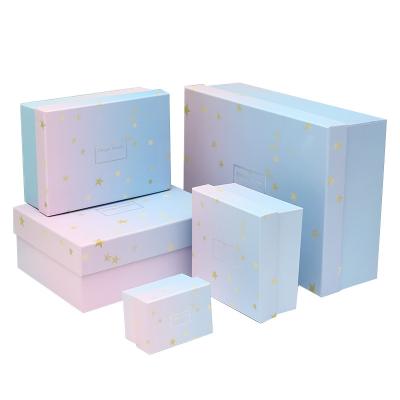 China Gradient Gift Box Set Luxury Cosmetic Perfume Packaging With Gold Stars for sale