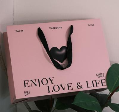 China Custom Pink Paper Tote Bags for Fashion Brands for sale