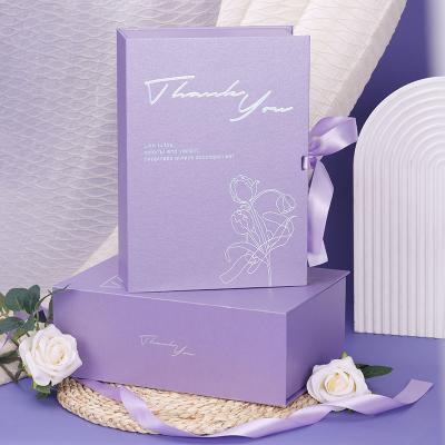 China Custom Purple Tulip Book Shaped Gift Box Ecofriendly Packaging for sale