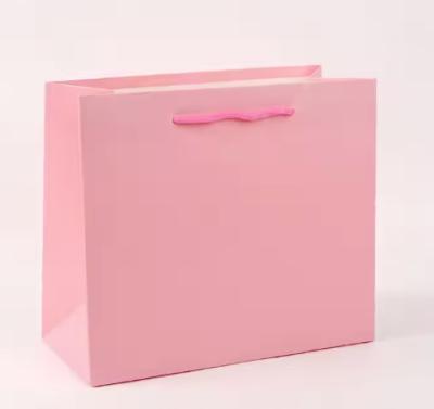 China Custom Luxury Brown Kraft Paper Bags for Jewelry Shops for sale