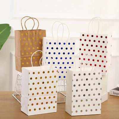 China Custom Gold Dot Kraft Paper Gift Bags with Twisted Handles for sale