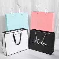 China Custom Printed White Paper Gift Bags with Ribbon Handles for sale