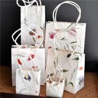 China Handmade Herb Paper Gift Bags Natural Fiber Pressed Flower Pouches Eco Friendly Wine Decor Packaging for sale
