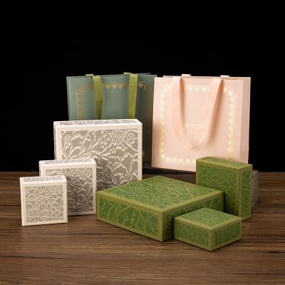 China Vintage Embossed Jewelry Box Set Premium Textured Hinged Cases Luxury Necklace Ring Display for sale