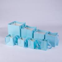 China Blue Square Gift Bag Custom Clothing Gift Packaging Bag White Cardboard Handbag Support Different Sizes for sale