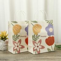 China Floral Printed Kraft Paper Gift Bags Versatile For GiftsApparel Shopping  Coffee for sale