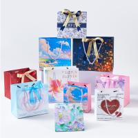 China Customized Pattern Foreign Trade Paper Bags Holiday Gift Bags Color Printing Packaging Bags for sale