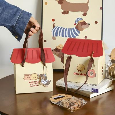China Adorable Dog Themed House Gift Boxes Packaging Ribbon Handles For Cookies Cakes Snowflake Crisps for sale