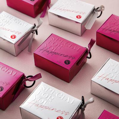 China Different Colors Of Exquisite Candy Boxes Wedding Gift Boxes Gold Hot Stamping Hand Packaging for sale