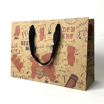 China Cartoon Kraft Paper Bag Handbag Gift Packaging Bag Clothing Store Shopping Bag Children'S Gift Paper Bag for sale