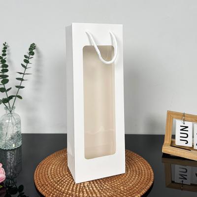 China Window Gift Bags Premium Multi Color Display Packaging Rope Handle Wine Flower Bags for sale