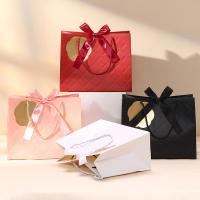 China Embossed Gold Foil Gift Bags Shopping Bags Clothing Gifts Customize for sale