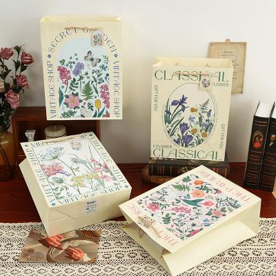 China Retro Light Luxury Gift Bag Holiday Gift Packaging Paper Bag Exquisite Souvenir Return Gift Handbag for sale
