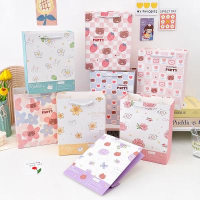 China New Cute Cartoon Vertical Gift Bag Holiday Gift Packaging Paper Bag Souvenir Return Gift Handbag for sale