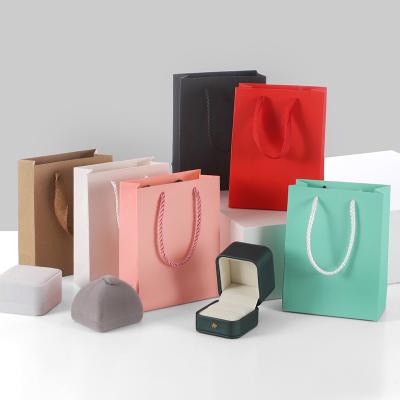 China Custom Kraft Paper Bag Tote Bag Cosmetics Jewelry Shopping Gift Packaging Thickened Hand Bag for sale
