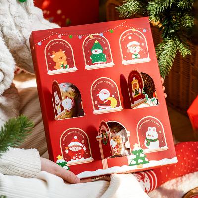 China Christmas Surprise Blind Box Set Interactive 9 Cell Cookie Gift Packaging Santa Reindeer Tree Designs for sale