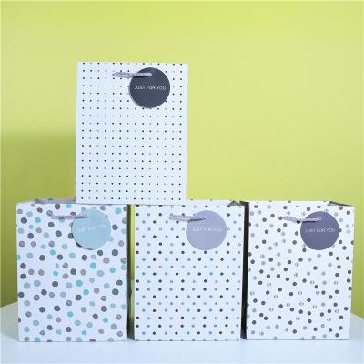 China White Card Handbag Star Gift Bag Polka Dot Granular Paper Bag Gift Packaging Bag for sale