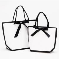 China Printable Luxury Paper Shopping Bags In Stock Minimalist INS Style High End Custom for sale