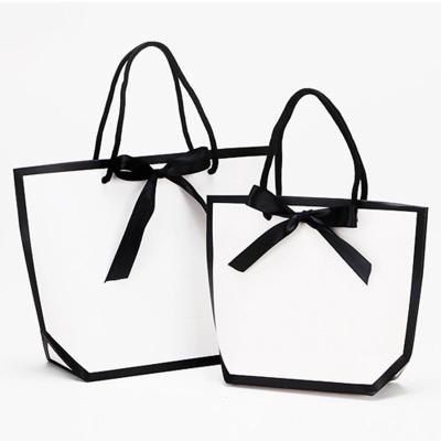 China Printable Luxury Paper Shopping Bags In Stock Minimalist INS Style High End Custom for sale