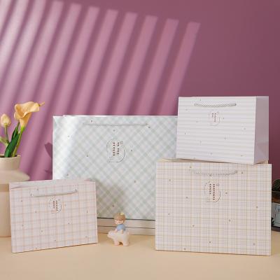 China Simple Striped Plaid Handbag Shopping Mall Paper Bag Plaid Birthday Gift Packaging Bag for sale