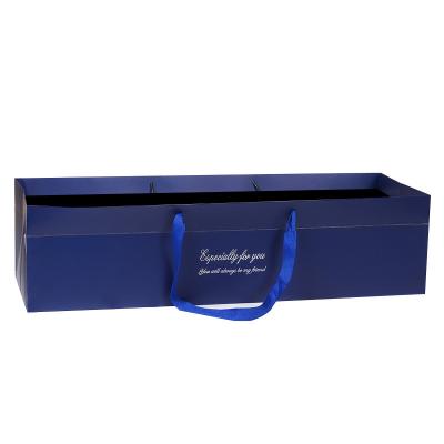 China Gold Foil Flower Box Bags Premium Gift Packaging Luxe Gold Stamping Rectangular Carry Handle Design for sale