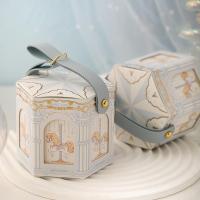 China Carousel Romance Candy Box Set European Hexagonal Wedding Favor Packaging Gold Foil Carousel Design Leather Handle for sale
