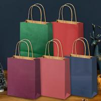 China Solid Color Kraft Paper Tote Bag Baking Takeaway Packaging Bag Customized Logo Clothing Packaging Paper Bag for sale