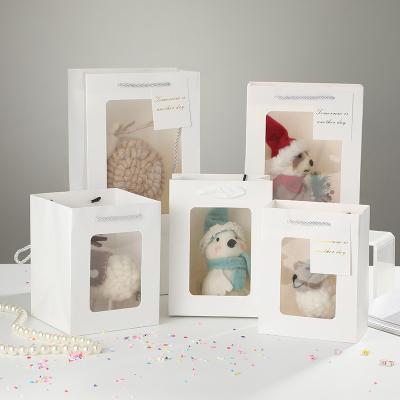 China Window Gift Bag Transparent Window Handbag Creative Gift Paper Bag Bouquet Packaging Handbag for sale