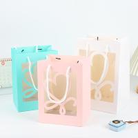 China Transparent Hand-Held Gift Bag Doll Hand-Held Bag Holiday Return Gift Gift Packaging Bag for sale
