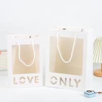 China Transparent Hand-Held Gift Bag Doll Hand-Held Bag Holiday Return Gift Gift Packaging Bag for sale