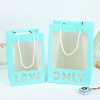 China Transparent Hand-Held Gift Bag Doll Hand-Held Bag Holiday Return Gift Gift Packaging Bag for sale