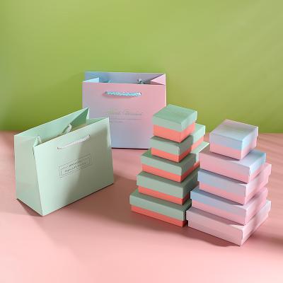 China Jewelry Box Set Holographic Valentines Packaging Sponge Lined Ring Case  Matching Gift Bags With Rope Handles for sale