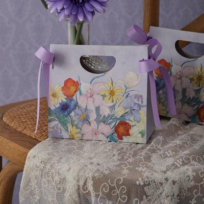 China Wedding Favor Box European Style Floral Luxury Packaging Satin Ribbon Handles Instagrammable Wedding Candy Box for sale