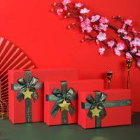 China Festive Red Bow Gift Box Set Premium Christmas Wedding Packaging Gold Star Embellishments Green Satin Ribbons for sale