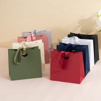 China Simple Paper Bag Handbag Gift Packaging Bag Jewelry Gift Hard Bottom Tote Paper Bag for sale