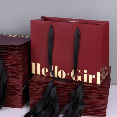 China Ins Style Clothing Store Shopping Bag High End Fashion Gift Paper Bag With Custom Logo Printing for sale