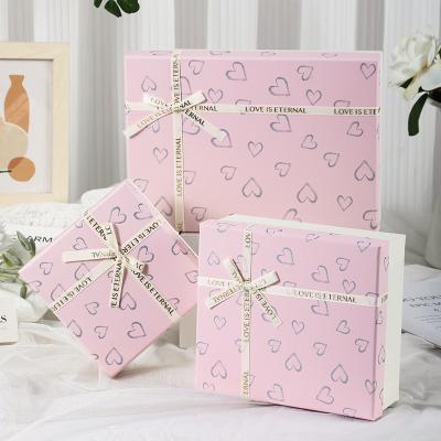 China Gift Box Set Premium Cosmetic Perfume Packaging Heaven Earth Lid Design Ribbon Heart Decor Valentines Day Birthday Presentation for sale